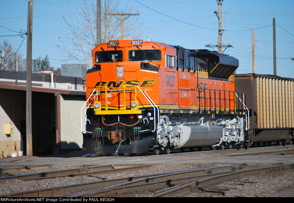 BNSF 9027 rolls out of BNSF Forsyth, MT as a rear DPU on a Loaded Coal Train.